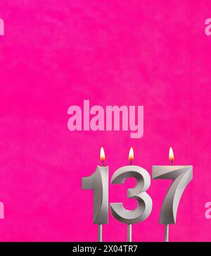 Birthday candle number 137 on white background Stock Photo - Alamy