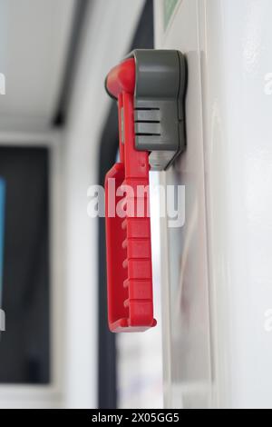 Safety Hammer in a bus and Glass breakage Stock Photo - Alamy
