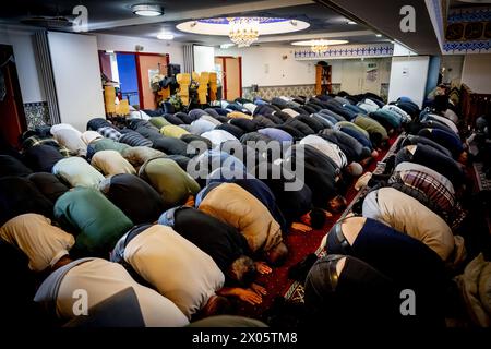 ROTTERDAM - Muslims during morning prayers in the Mevlana Mosque. Eid ...