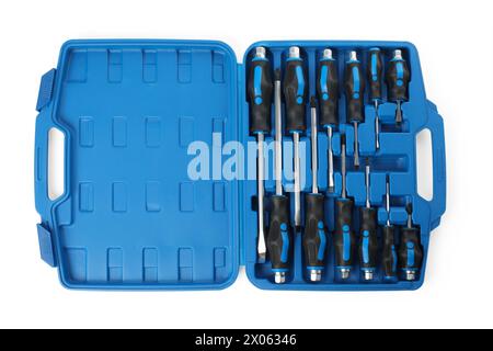 Set of screwdrivers in open toolbox on light grey textured table, top ...