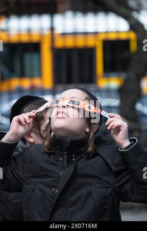 On the day before the 2024 eclipse, an orthodox Jewish boy tries on his ...