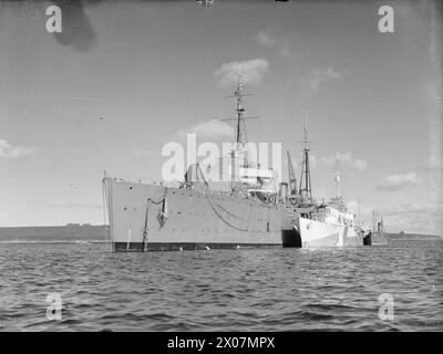 THE DAILY ROUTINE OF HMS TYNE, A DESTROYER DEPOT SHIP. FLEET ANCHORAGE ...