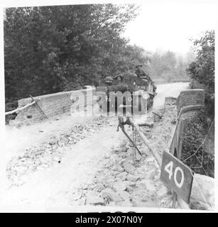 THE ATTACK IN THE S/W AREA OF CAEN FOR EVRECY - Infantry moving through ...