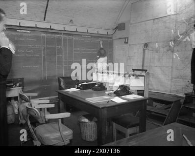 NAVAL PLOTTING AT DOVER. 17 APRIL 1945. - A scene in one of the ...
