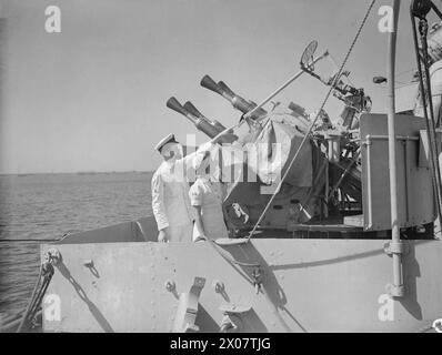 WRNS VISIT THE CRUISER HMS EURYALUS OF THE MEDITERRANEAN FLEET. 3 MAY ...
