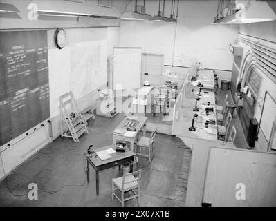 NAVAL PLOTTING AT DOVER. 17 APRIL 1945. - A scene in one of the ...