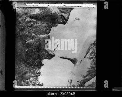 WORLD WAR II: TORPEDO NET. /nA U.S. Navy ship laying an anti-torpedo ...