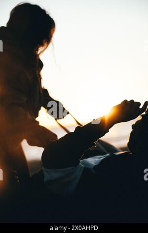 Sunset hunting at st kilda beach Stock Photo - Alamy