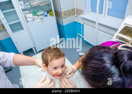 dressing a boy with a burn from boiling water Stock Photo - Alamy