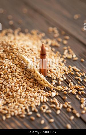 Scattered Wheat Grains and Bullet Shells on a Wooden Surface Stock ...