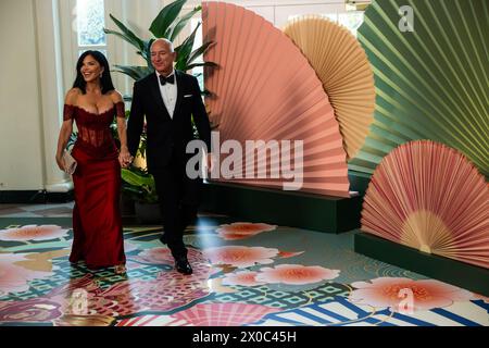 Jeff Bezos and Lauren Sanchez, inside boat, pass by the San Giorgio ...