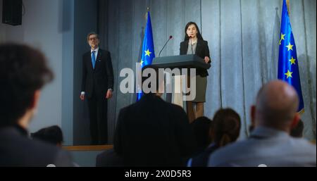 Female politician comes to tribune, delivers campaign speech, answers ...