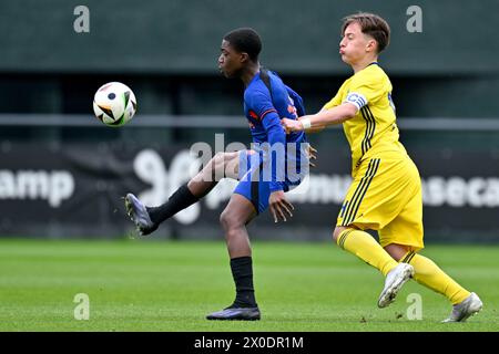 Pharell Nash (18) of The Netherlands and Dino Kolic (14) of Sweden ...