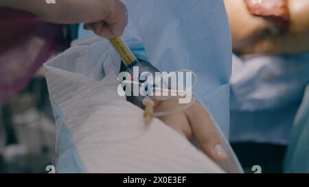 Injection of anesthetic into a syringe. Epidural anesthesia Stock Photo ...