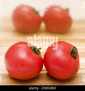 Round Pink tomato with a nose that produces heart shape when cut in ...
