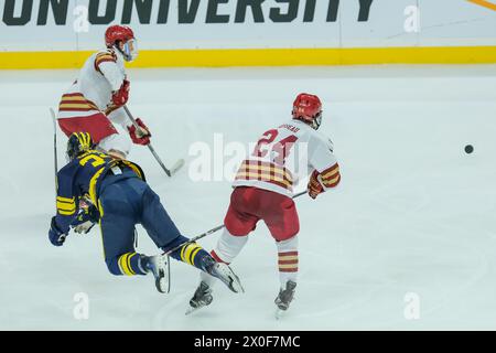 Boston College forward Andre Gasseau (24) skates during the first ...