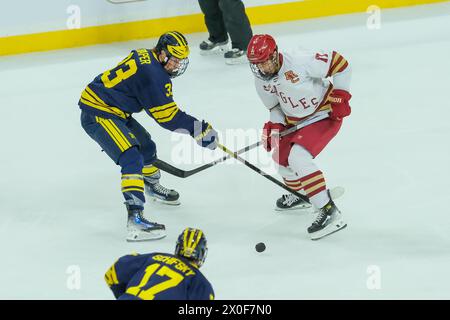 Boston College defenseman Aram Minnetian (17) skates during the second ...