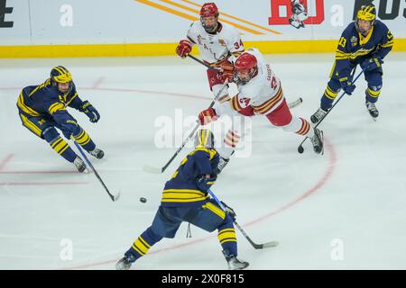 Boston College forward Andre Gasseau (24) skates during the first ...