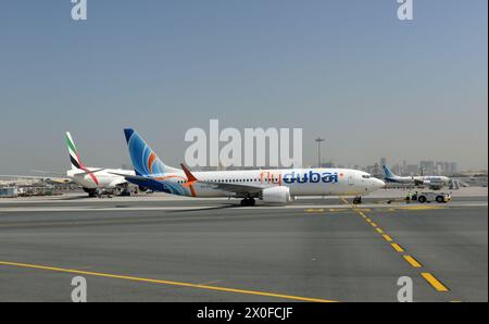 A Fly Dubai airplane at the International airport in Dubai, UAE Stock ...