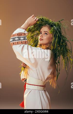 A beautiful young fairy in a crown of branches. Halloween concept Stock ...