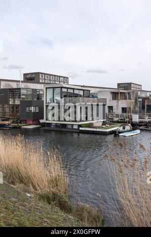 Floating homes and houses in the Waterbuurt (Water District) of Ijburg ...