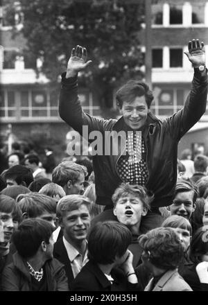 "Visitors during the Beatles concert in Essen, Germany: The police take ...