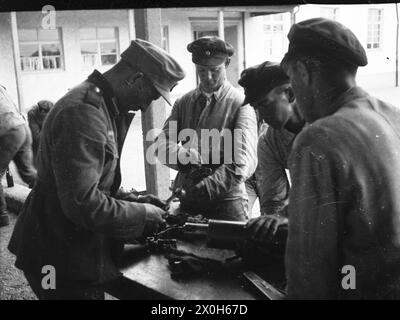 After firing, the machine gun is dismantled and cleaned by Wehrmacht ...