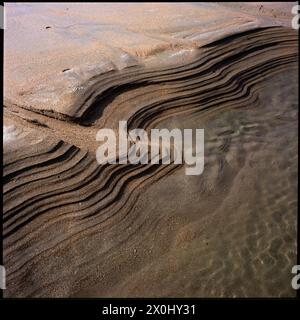 Sand formations during low tide on the Grande Côte before La Barre de ...