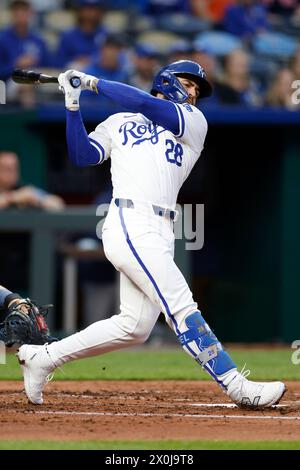 Kansas City Royals' Kyle Isbel (28) scores past Baltimore Orioles ...