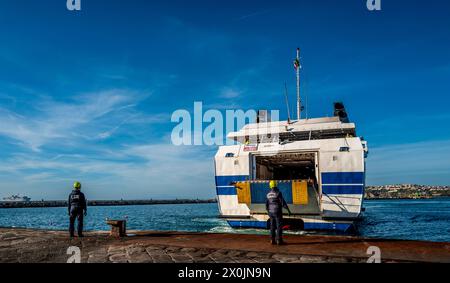 The Caremar ferry Isola di Vulcano arriving in Procida, Bay of Naples ...