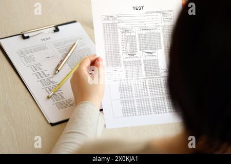 testing in exercise and exam paper. computer sheet with pencil in ...