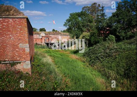 Castle wall and moat of the Dömitz Citadel fortress, exterior view ...