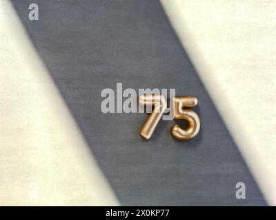Number 75 (number seventy-five) Anniversary celebration design with a ...