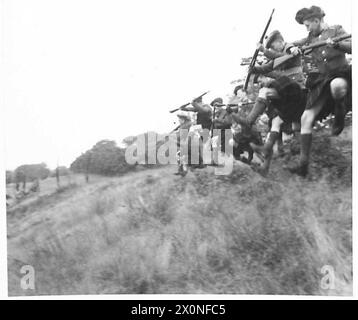 LIVERPOOL SCOTTISH CADETS IN TRAINING - Boys advancing by short rushes ...