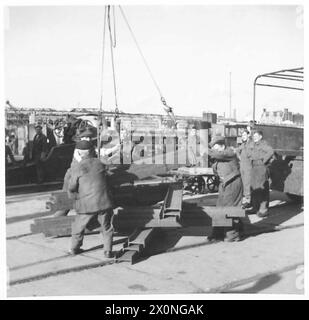 THE ARMY'S FLEET - Loading metal angles for building beach defences ...