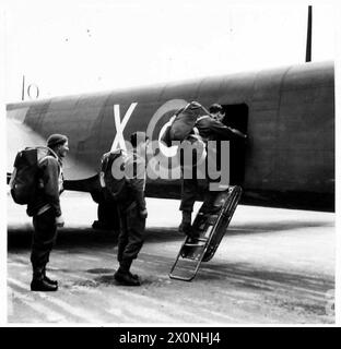 British parachute troops boarding a plane as part of training exercises ...