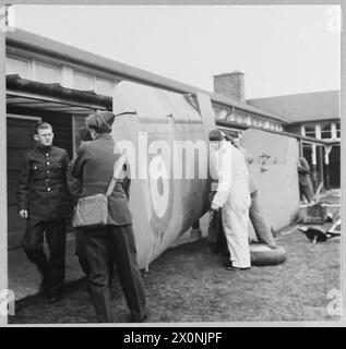 AIR TRAINING CORPS CADET UNDER INSTRUCTION - A.T.C. Cadets clambering ...