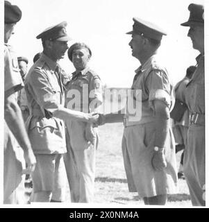 King George VI shaking hands with the Manchester United team before the ...