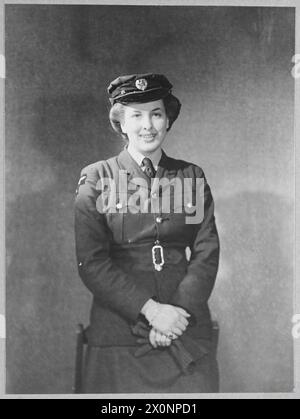 Aircraftwoman Priscilla 'Paddy' Barnes of the WAAF monitors aircraft in ...