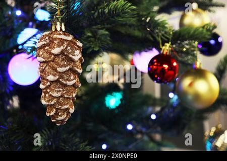 Magically decorated Christmas Tree with balls, ribbons and garlands on ...