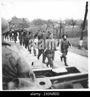 German prisoners are shown captured by the British Army during ...