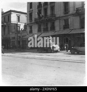 Allied forces leadership moves through a Normandy orchard in a military ...
