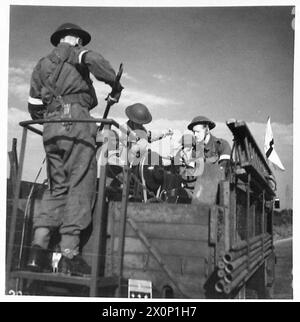 ROYAL CORPS OF SIGNALS - A cable detachment laying from a layer. Lines ...