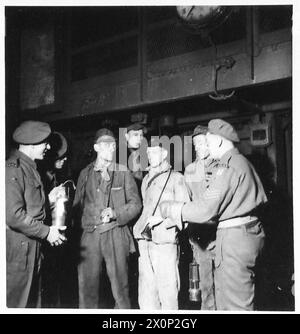 BRITISH SOLDIERS VISIT COAL MINE IN HOLLAND - From the mines slag heap ...