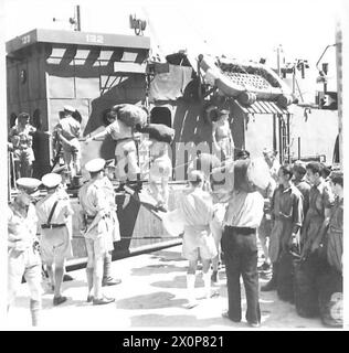FIRST SICILIAN PRISONERS LEAVE MALTA - Prisoners leave cage to go to ...