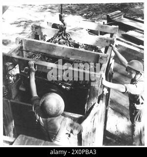 TANK RECOVERY AND REPAIR - A tank engine being repaired by REME ...