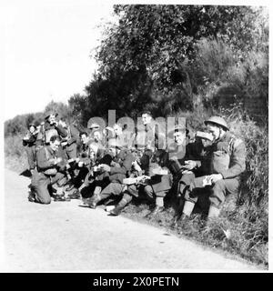 A photographic negative showing soldiers taking turns in the cookhouse ...