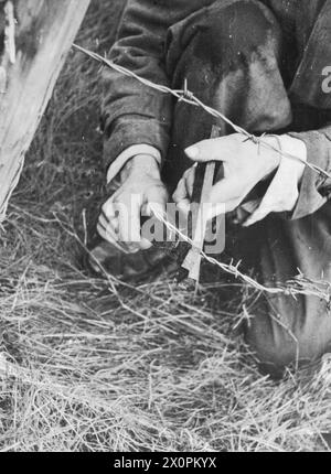 An Allied prisoner of war at Stalag Luft III, Sagan, sails a model ...