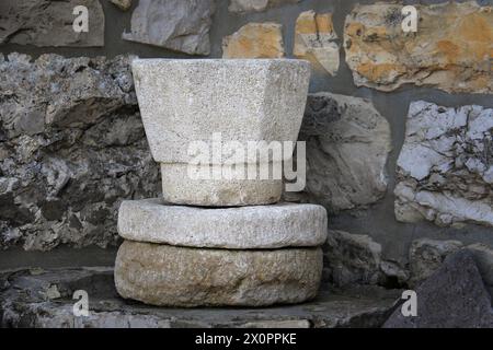 A traditional stone mortar traditionally used to make kibbeh in Lebanon ...