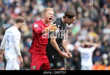 Blackburn Rovers' Callum Brittain (right) is tackled by Sheffield ...
